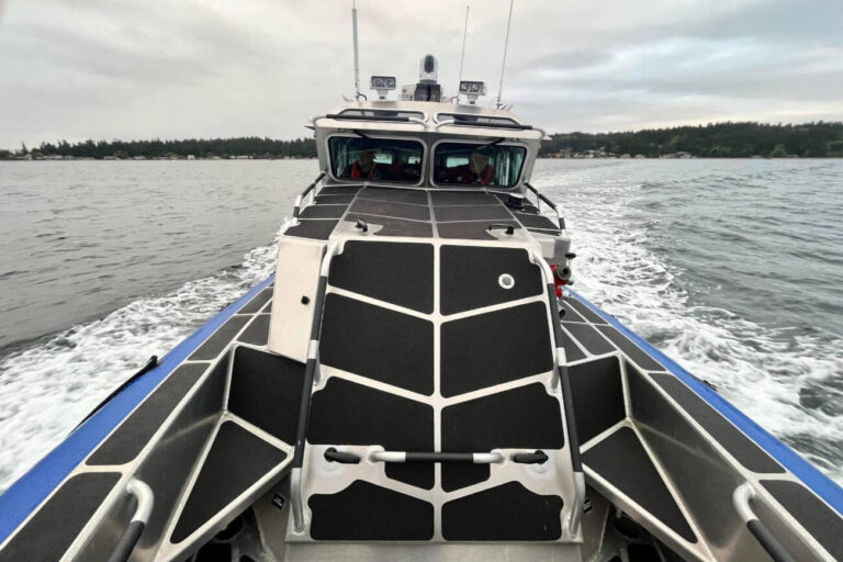 Everett Fire crews rescue four people after their raft capsizes Sunday