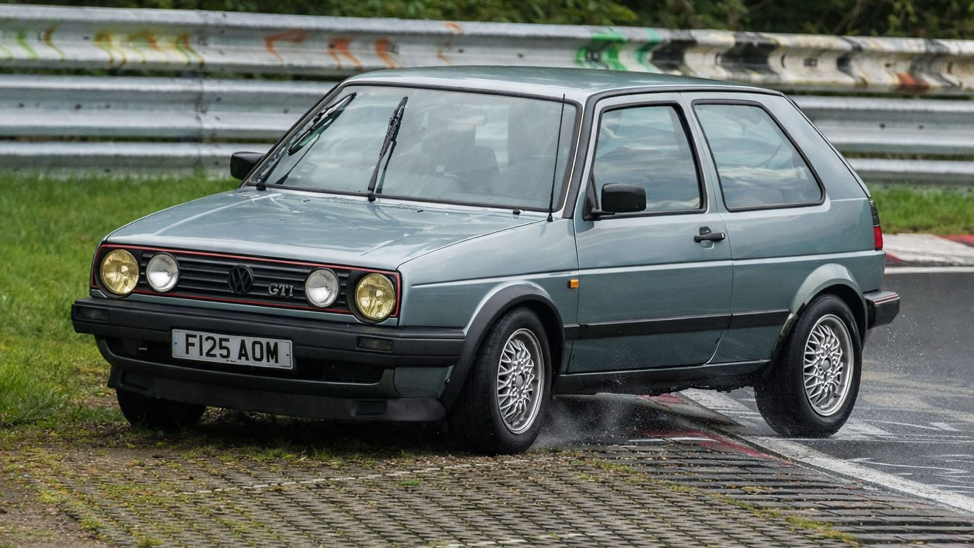 Slow car pushed hard, runs wide