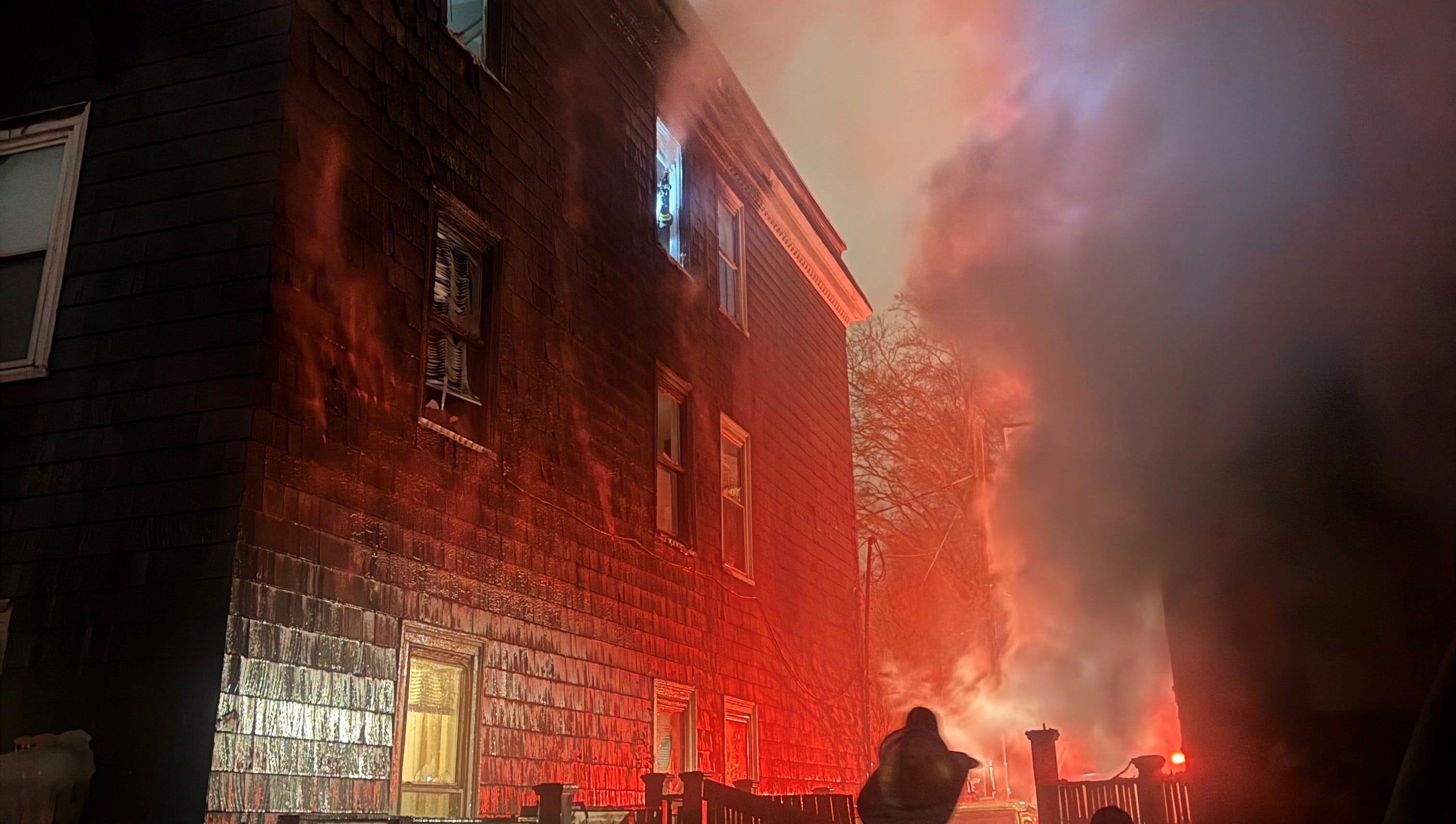 Crews battle fire at Jamaica Plain home