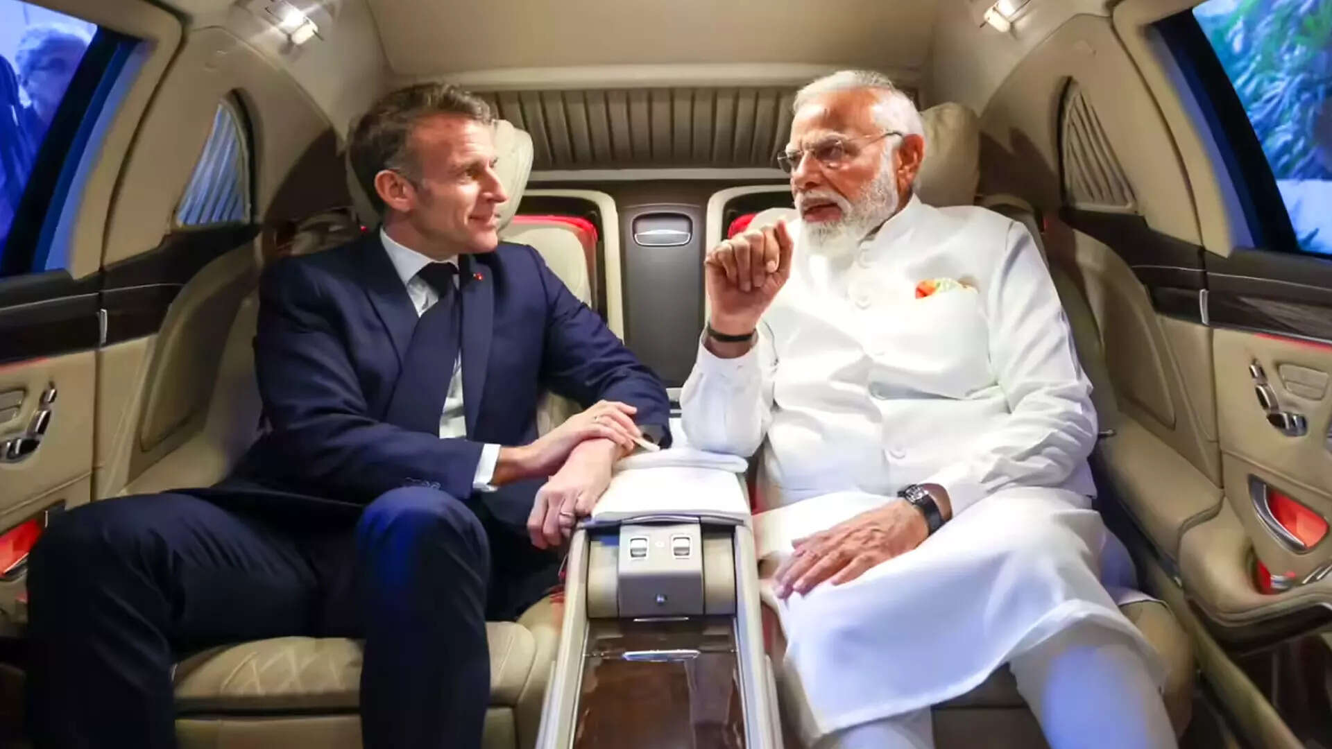 PM Modi's car diplomacy continues as he shares ride with Macron, French ...