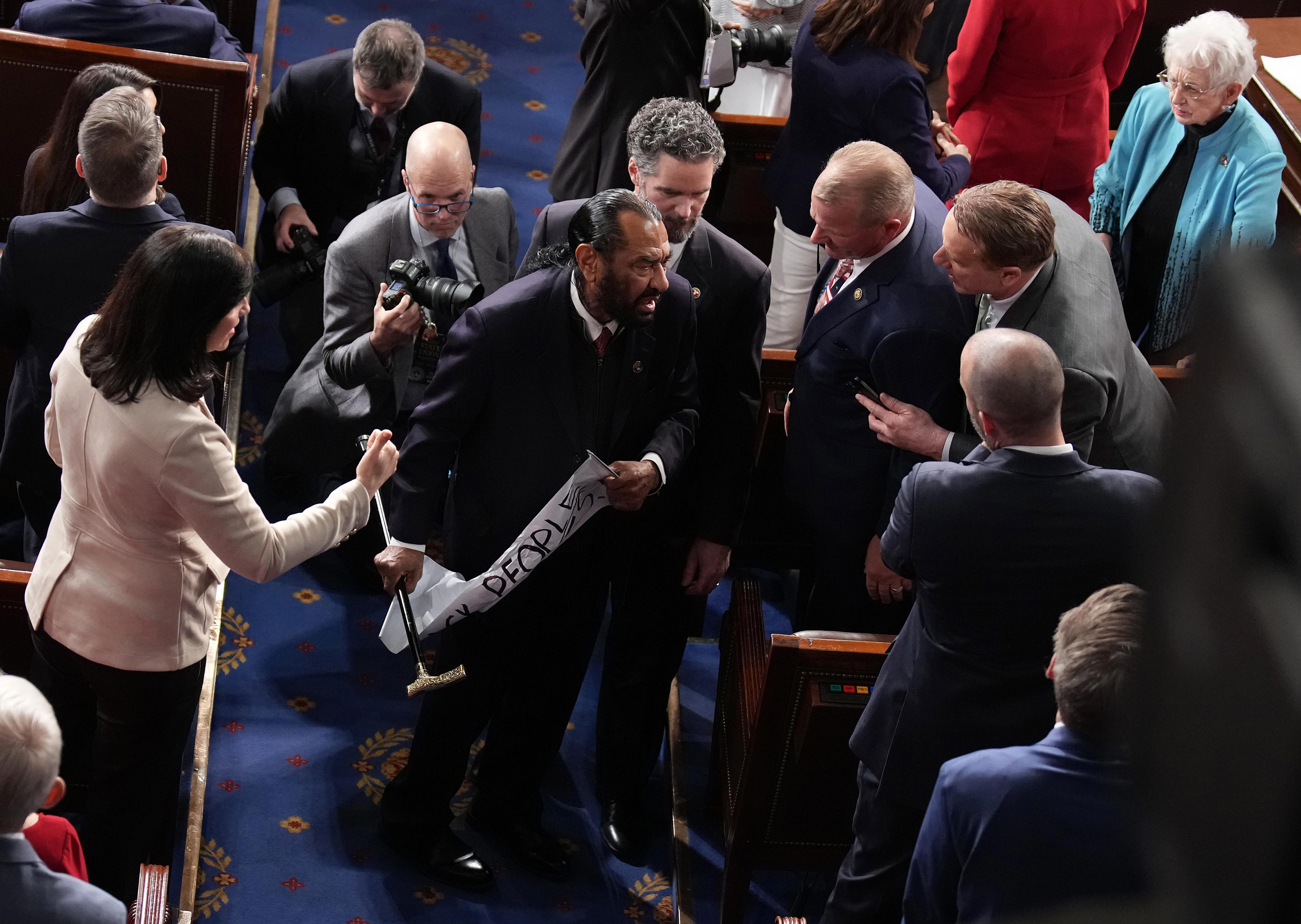 Who got kicked out of State of the Union? Rep. Al Green held 'apes' sign