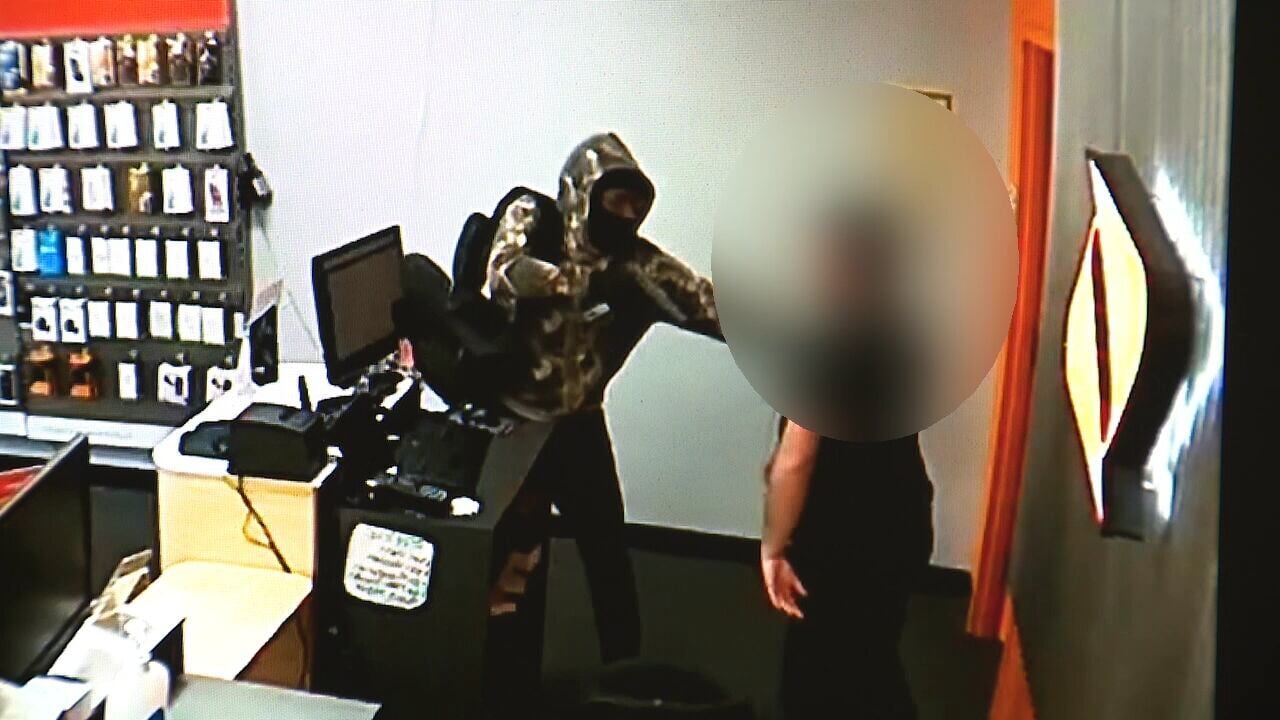 Masked gunman shoots Boost Mobile employee during armed robbery in ...