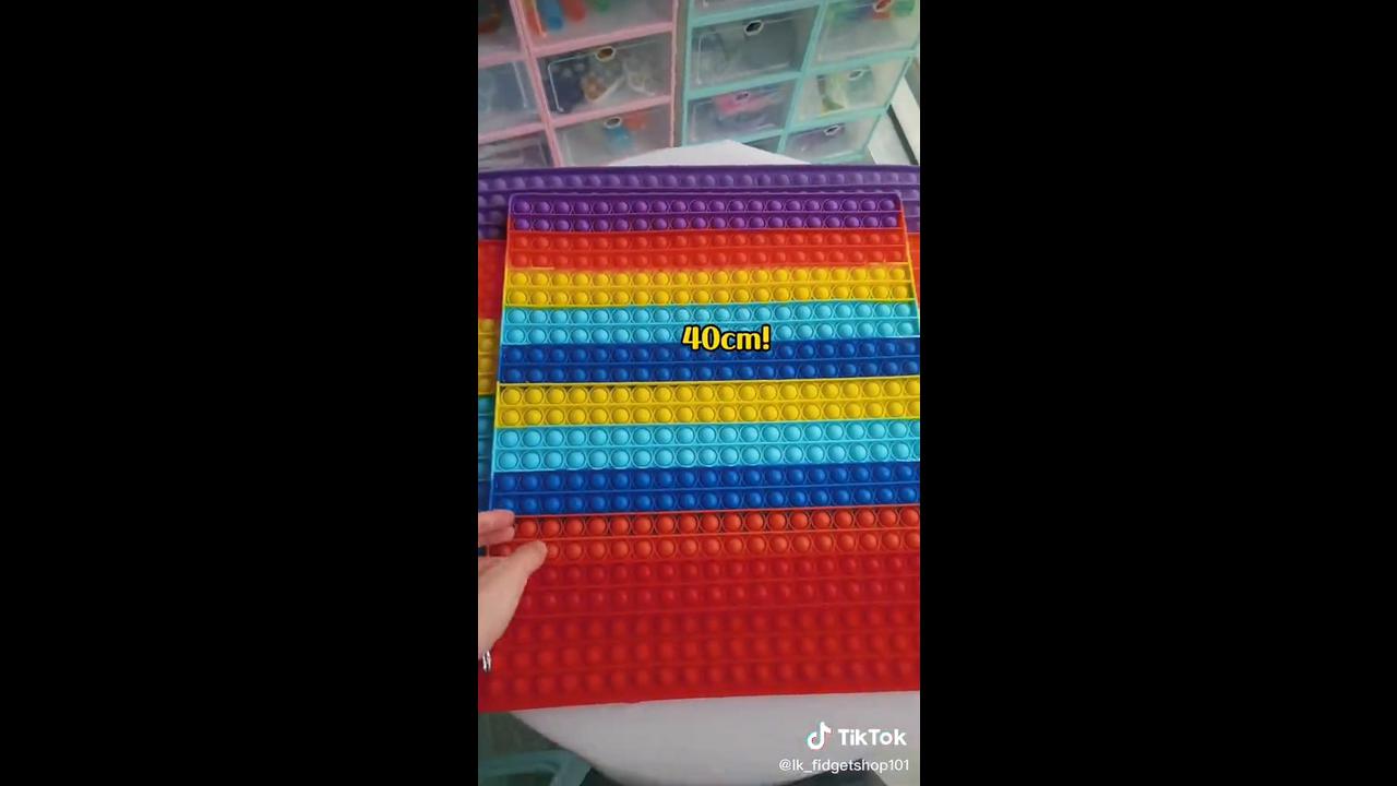 Different sizes squared rainbow pop it