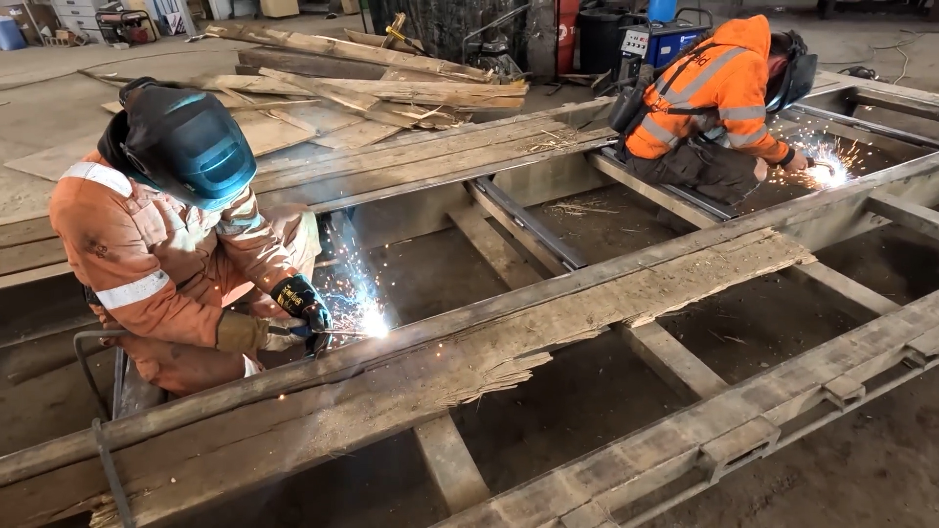 Dual welding operation on heavy steel frame
