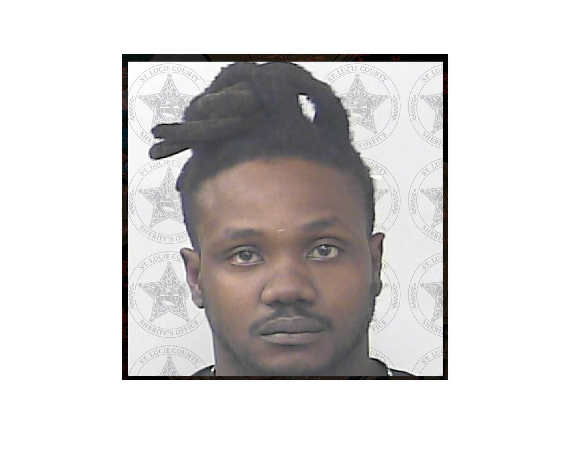 Fort Pierce man arrested after drugs and guns found in home raid