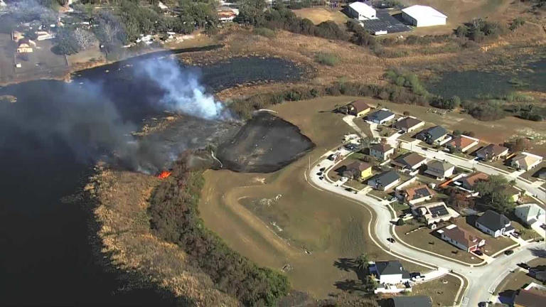 1.5-acre brush fire burns near homes in Orange County subdivision