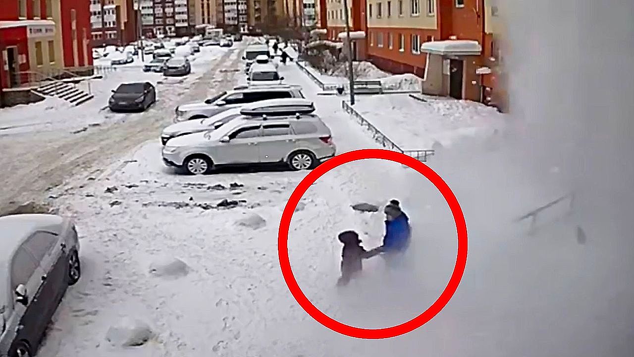 Grandmother shields child from snow slab in Russia