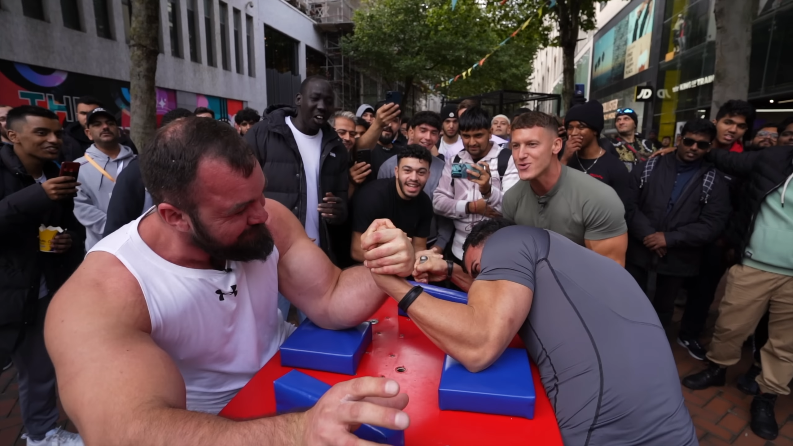 This guy really thought he could beat a pro arm wrestler