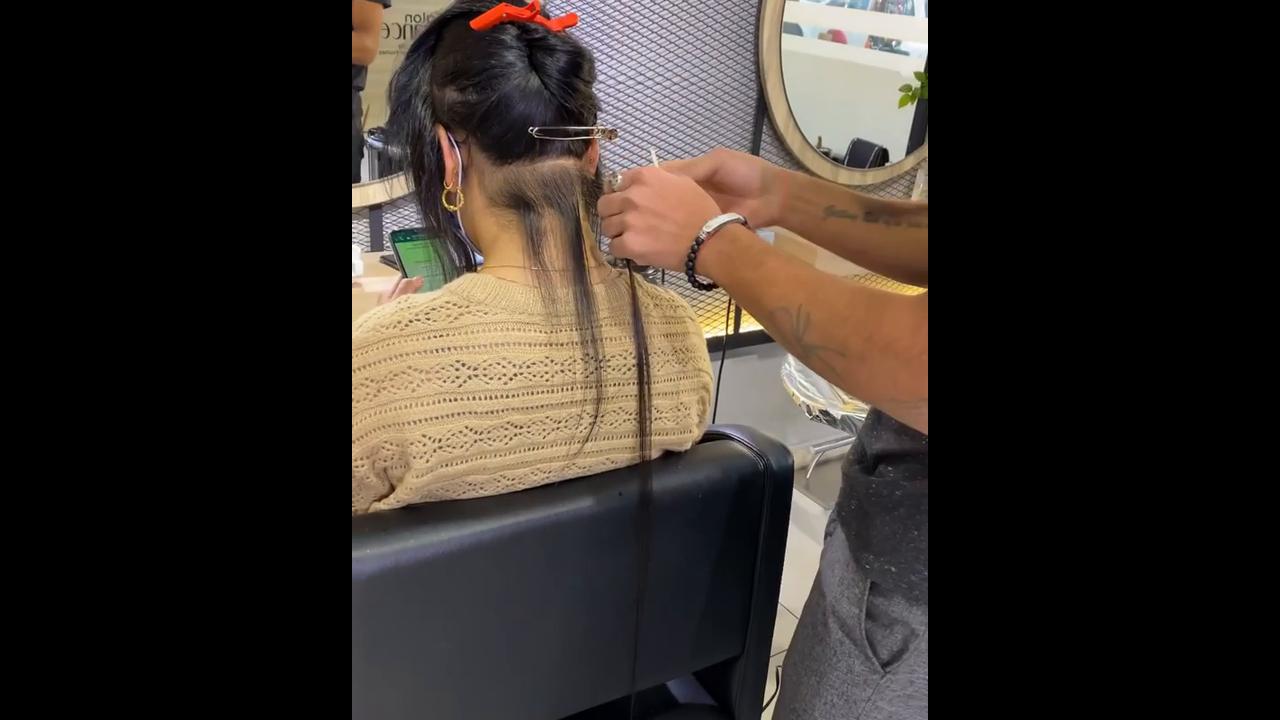 The art of creating glossy jet black long wave hair transformation