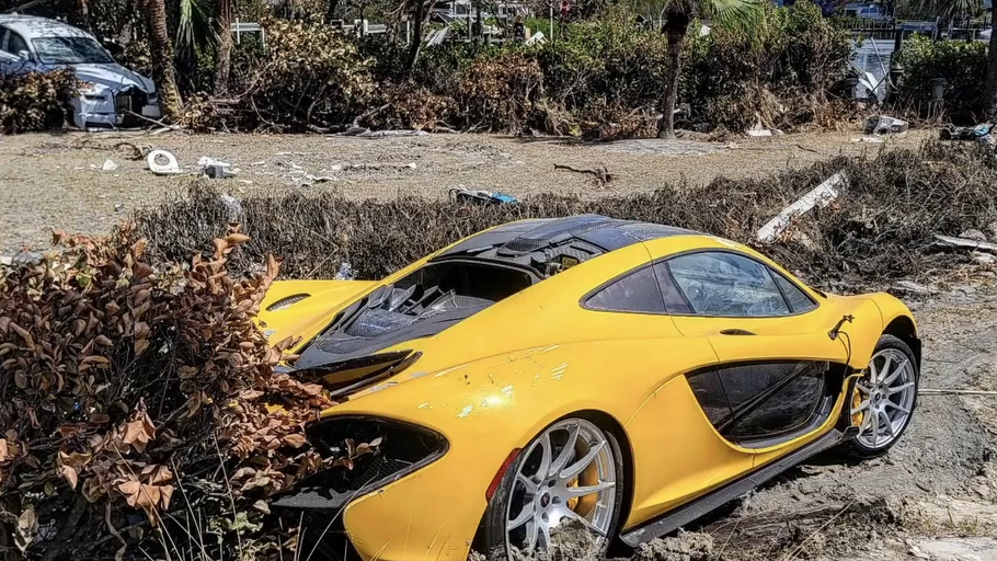 Prince’s crashed McLaren vs a flood car - $2,000,000 question