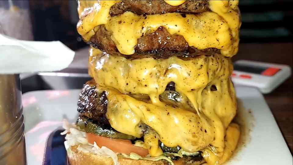 Trying to break the record on this giant cheeseburger food challenge