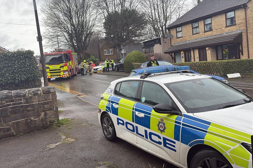 Woman dies after being hit by BMW before it drove 'straight into wall ...