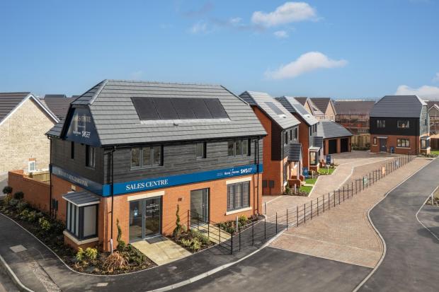 Builder of UK homes cuts prices by £100k as it races to sell properties