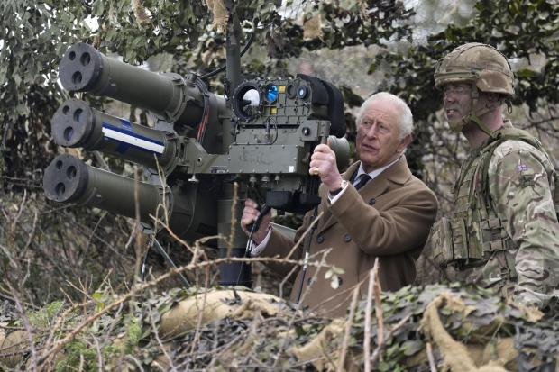 King has a go with defence missile launcher during Sussex visit
