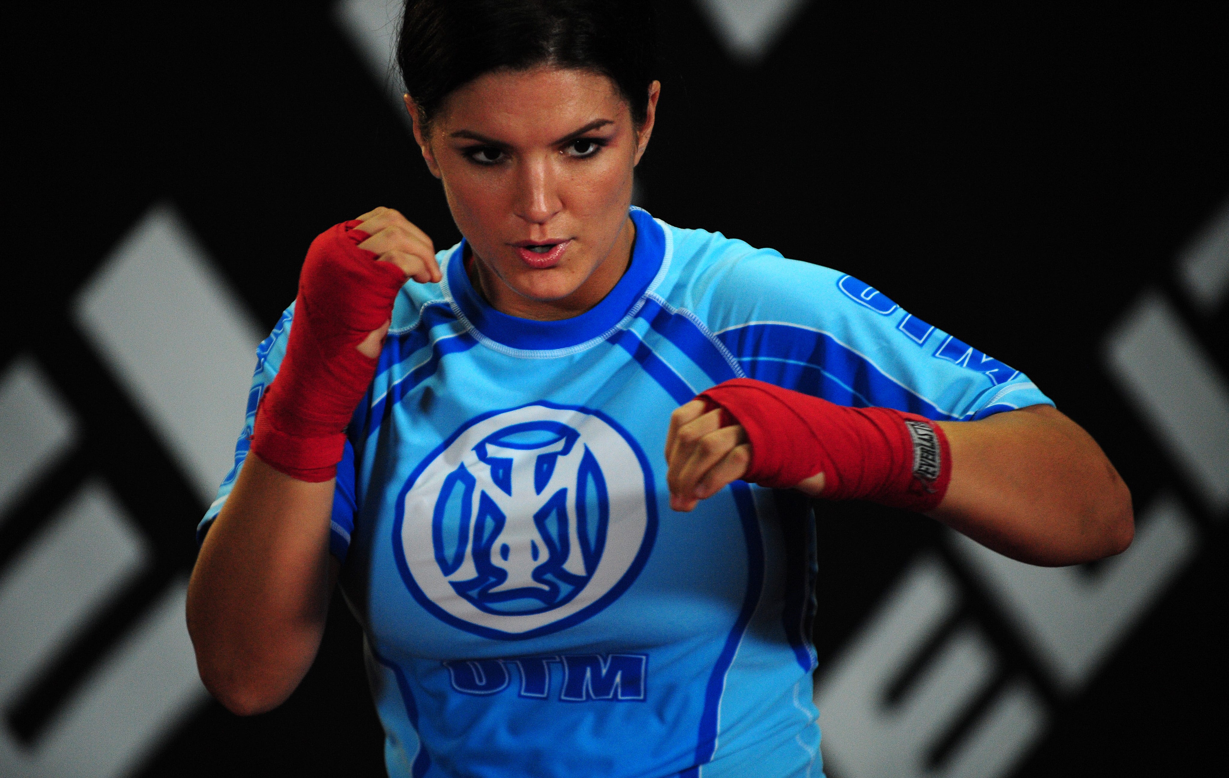 Best photos of MMA legend and actress Gina Carano