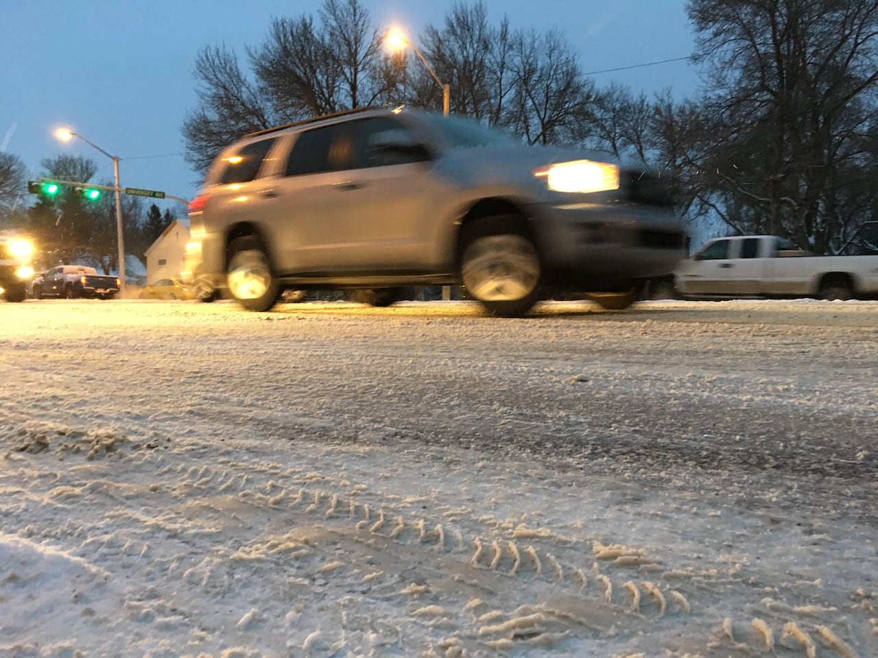Snow squalls whip across Alberta, triggering weather warnings