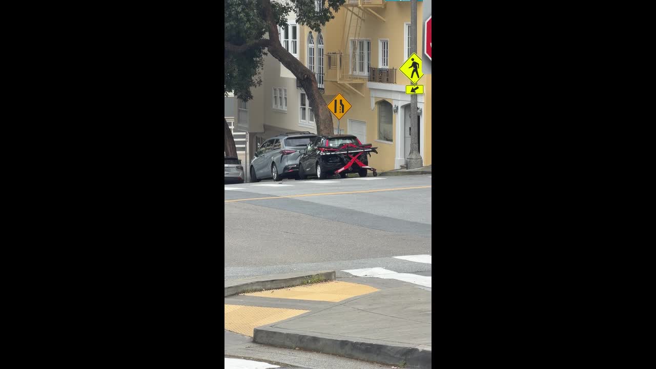 Stretcher rolls at dangerously high speed downhill dodging cars before ...