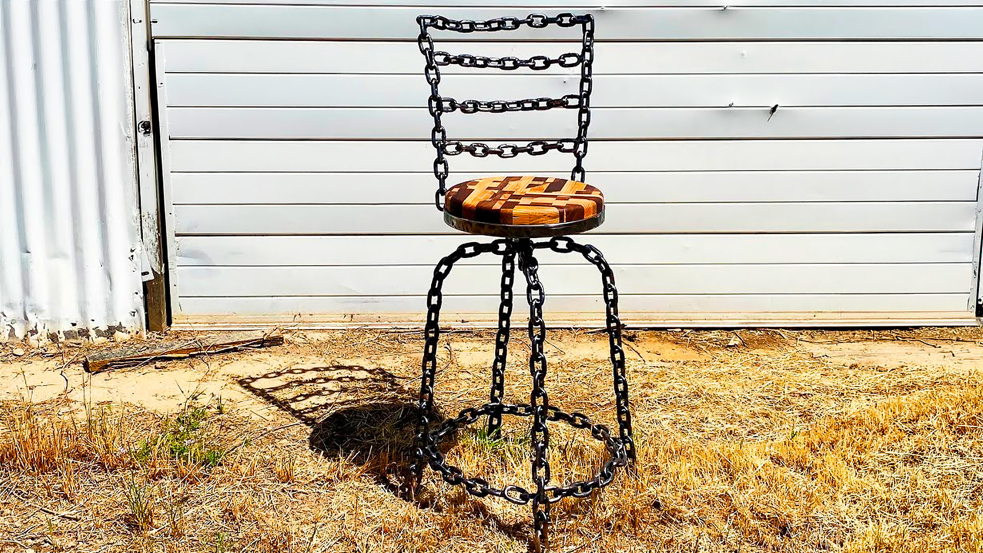 I built a shop chair from scrap wood and chain 🔧