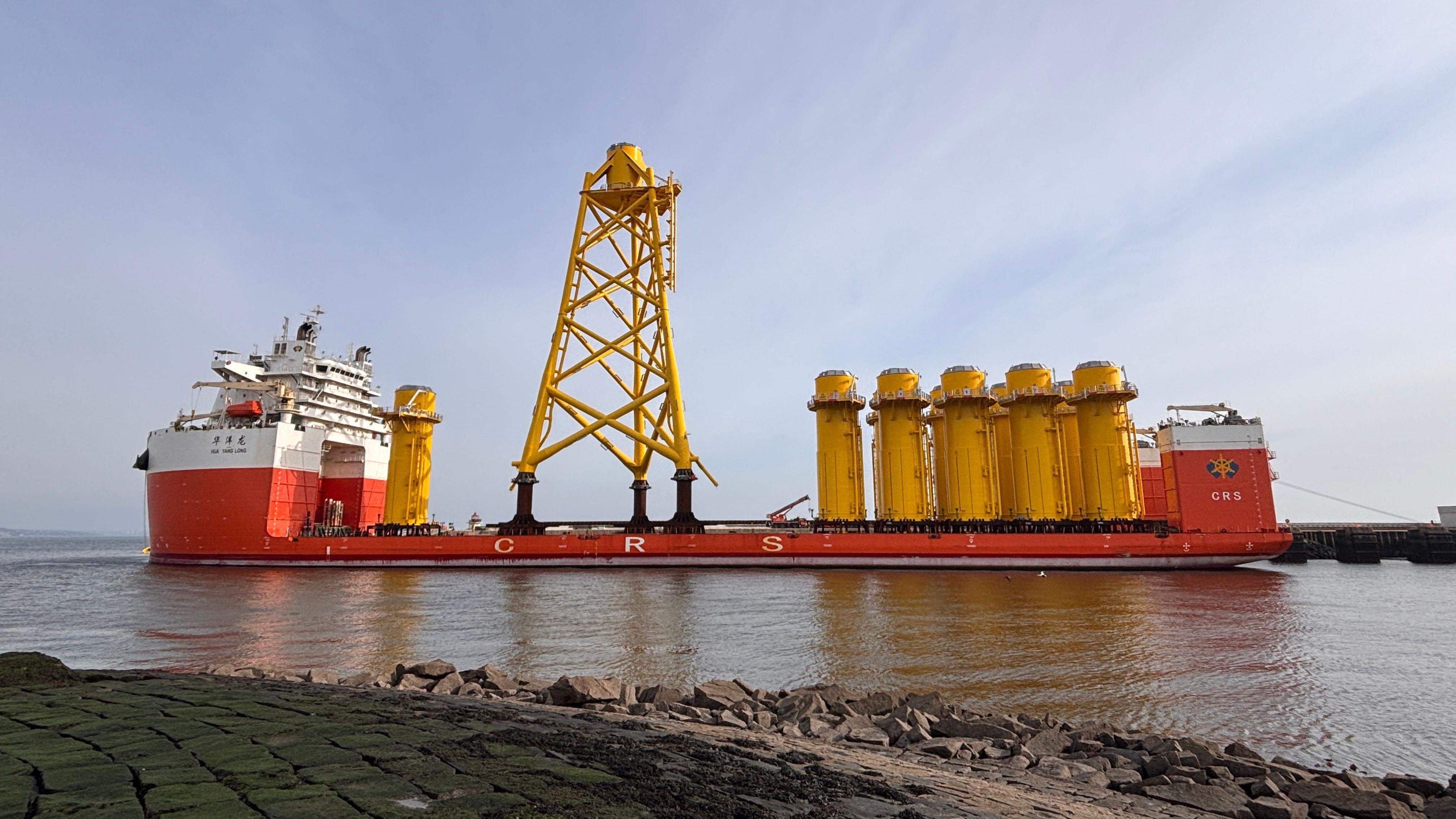 Huge ship carrying wind farm parts docks in Leith