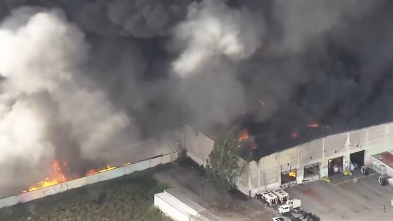 Miami Gardens fire videos: Massive four-alarm blaze engulfs warehouse ...