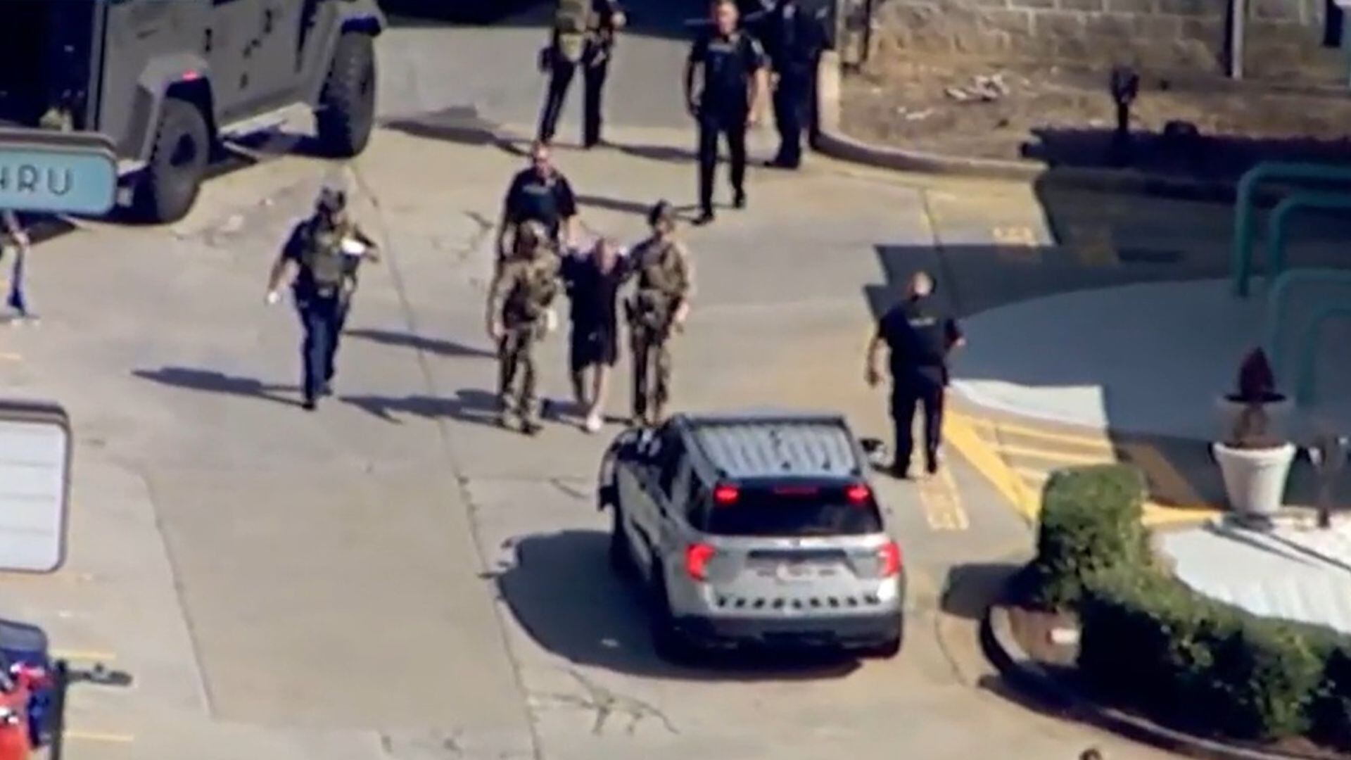 Watch: Man arrested after SWAT standoff at Woodstock auto repair shop