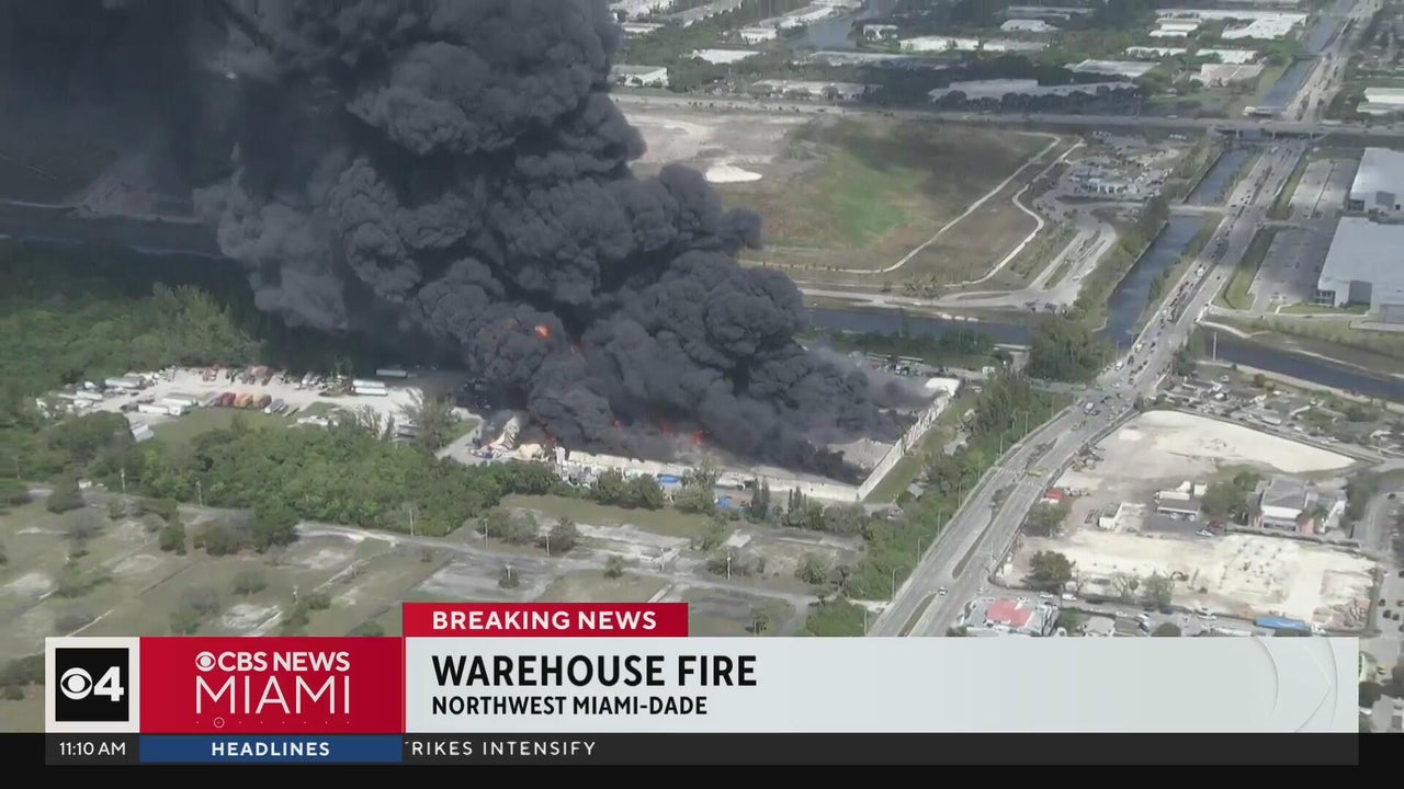 Massive warehouse fire in northwest Miami-Dade fills sky with thick ...