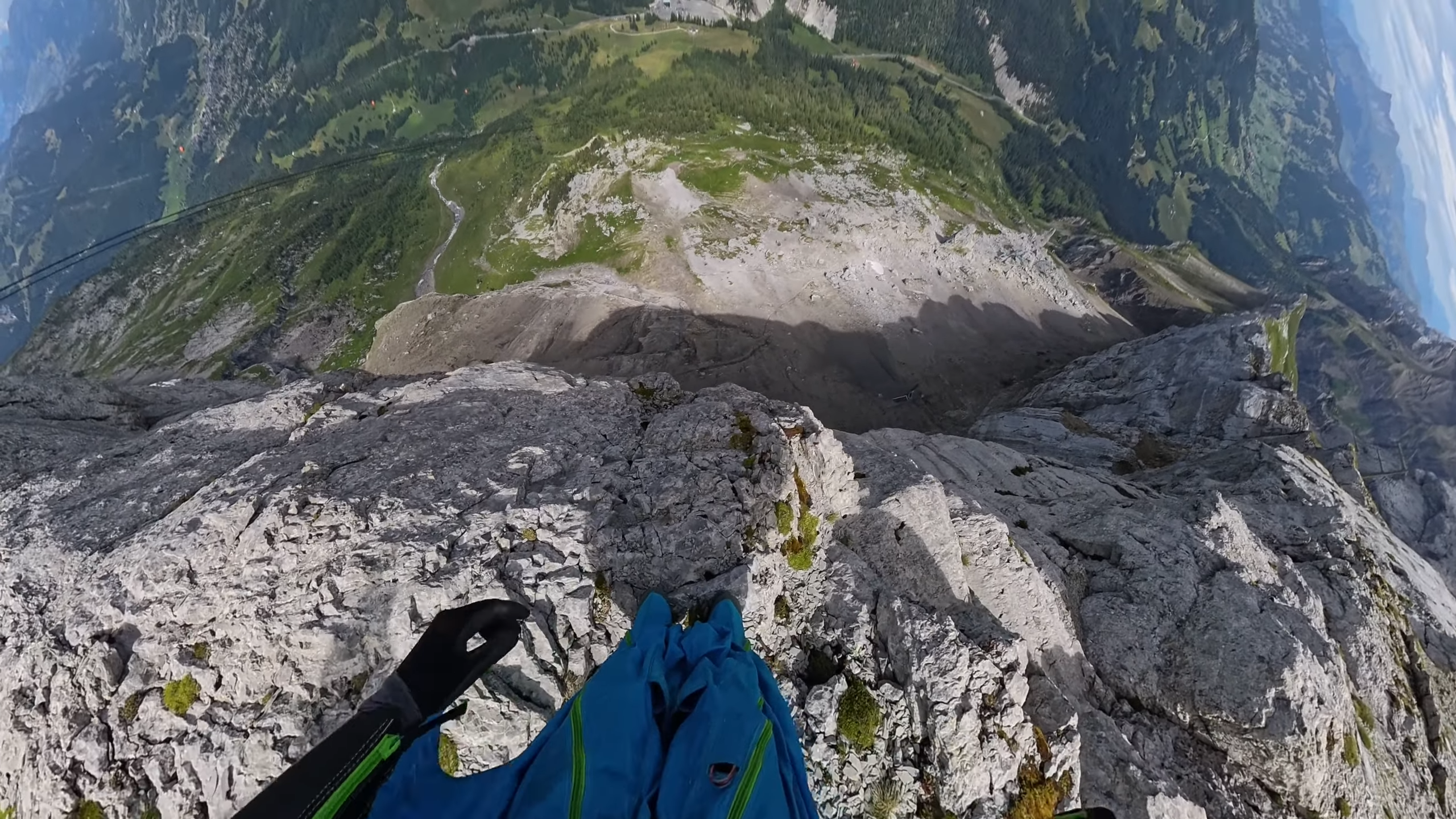 Man jumps from a cliff - and almost hits a cow on the way down