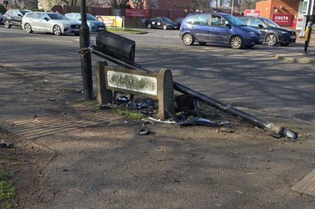Woman taken to hospital after colliding with lamppost at busy junction