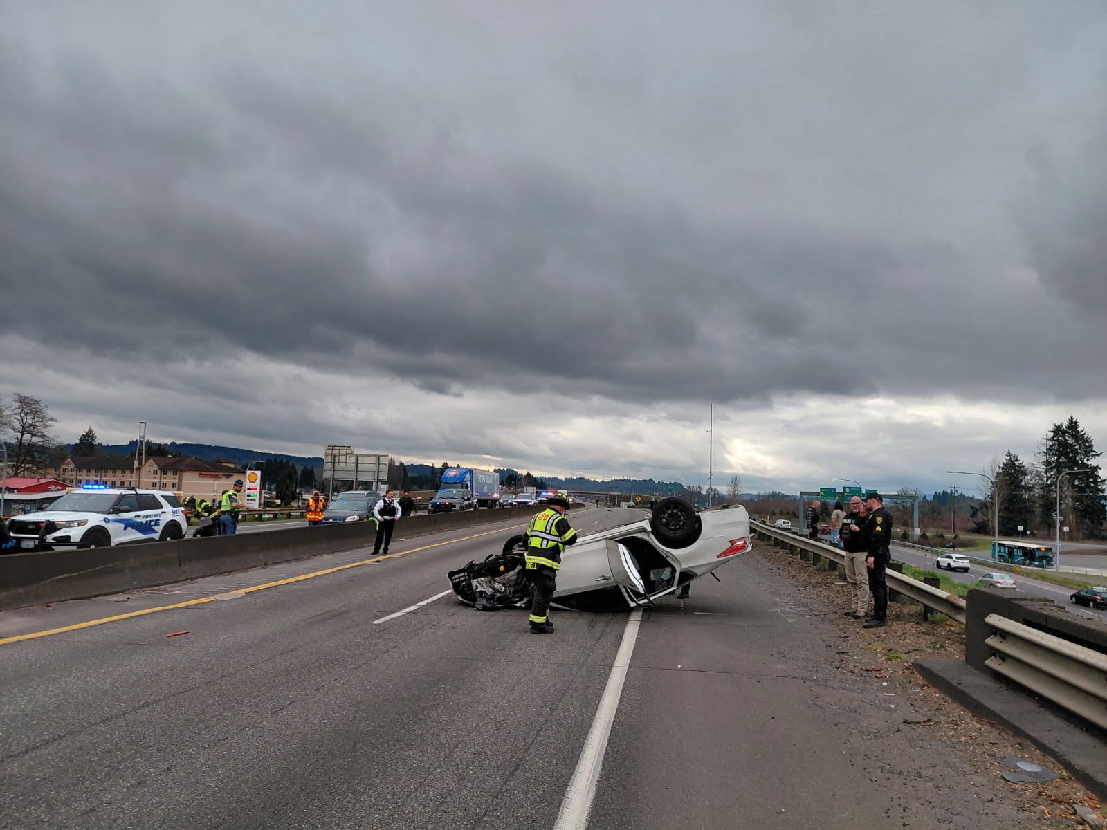 Watch: 100-mph crash sends car skidding down I-5 with child inside