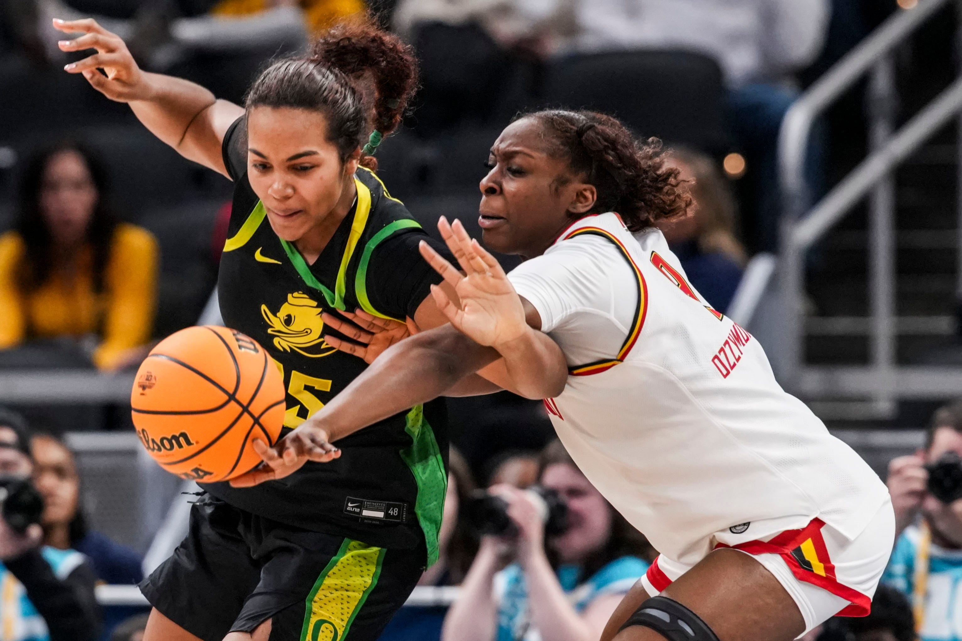 Etute heroics, Cain dagger send Oregon women to upset win vs. Maryland
