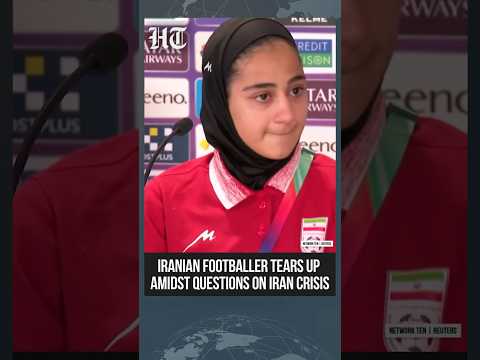 Iran footballer Sara Didar tears up during press conference in Australia