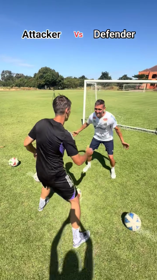Football reaction drill attacker trying to beat defender