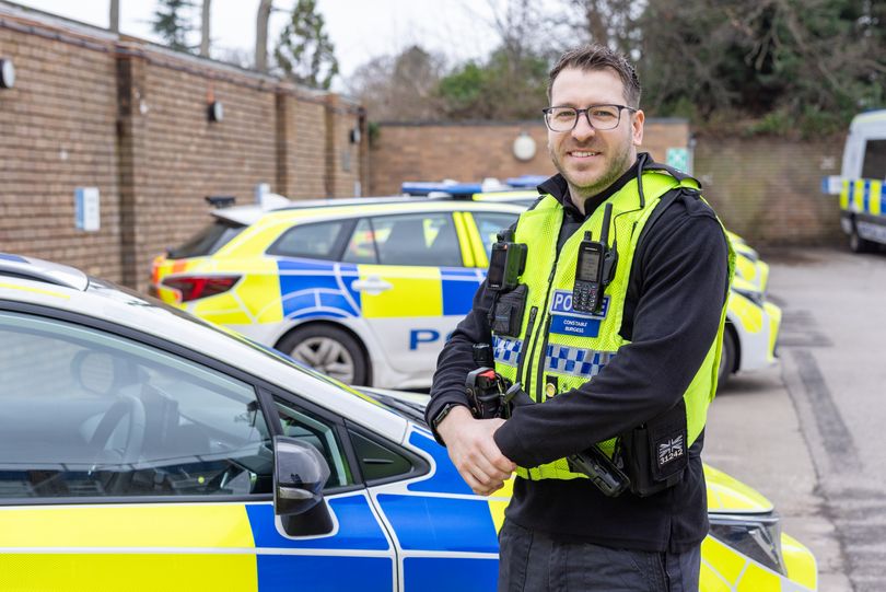Brave police officer dodged HGVs to rescue man walking on M53