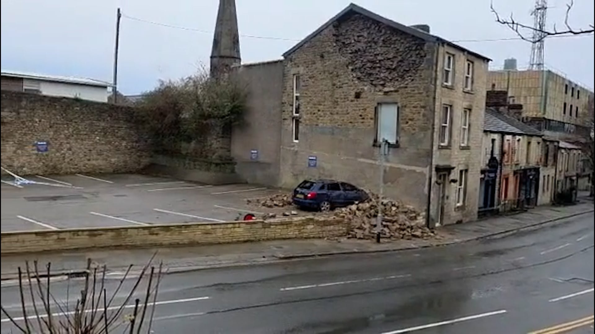 Car passes its MOT then is crushed by bricks which fell off house