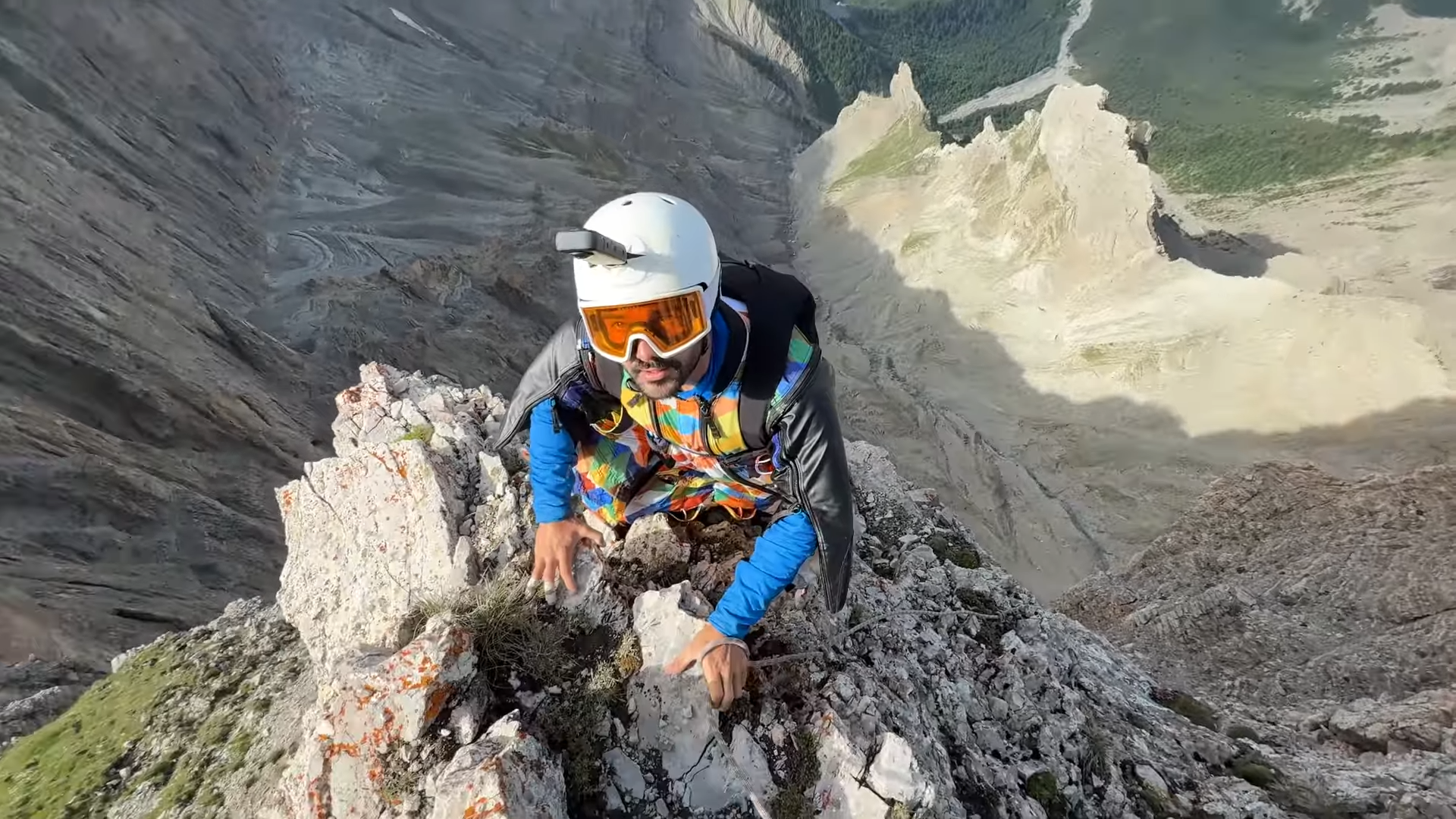 Man flies inches from a deadly cliff - and it gets intense fast