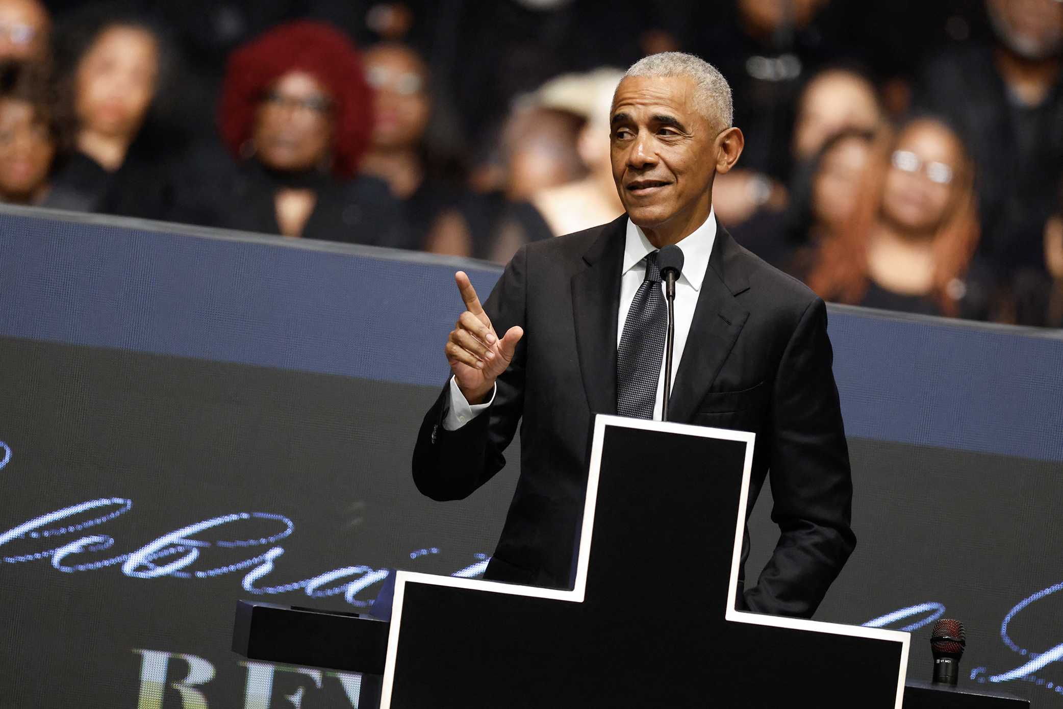 Former President Barack Obama speaks during final public tribute to the ...