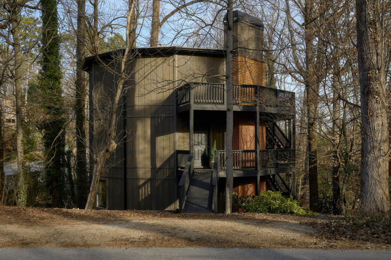 This 1970s circular home is moody luxury meets grandma’s cabin