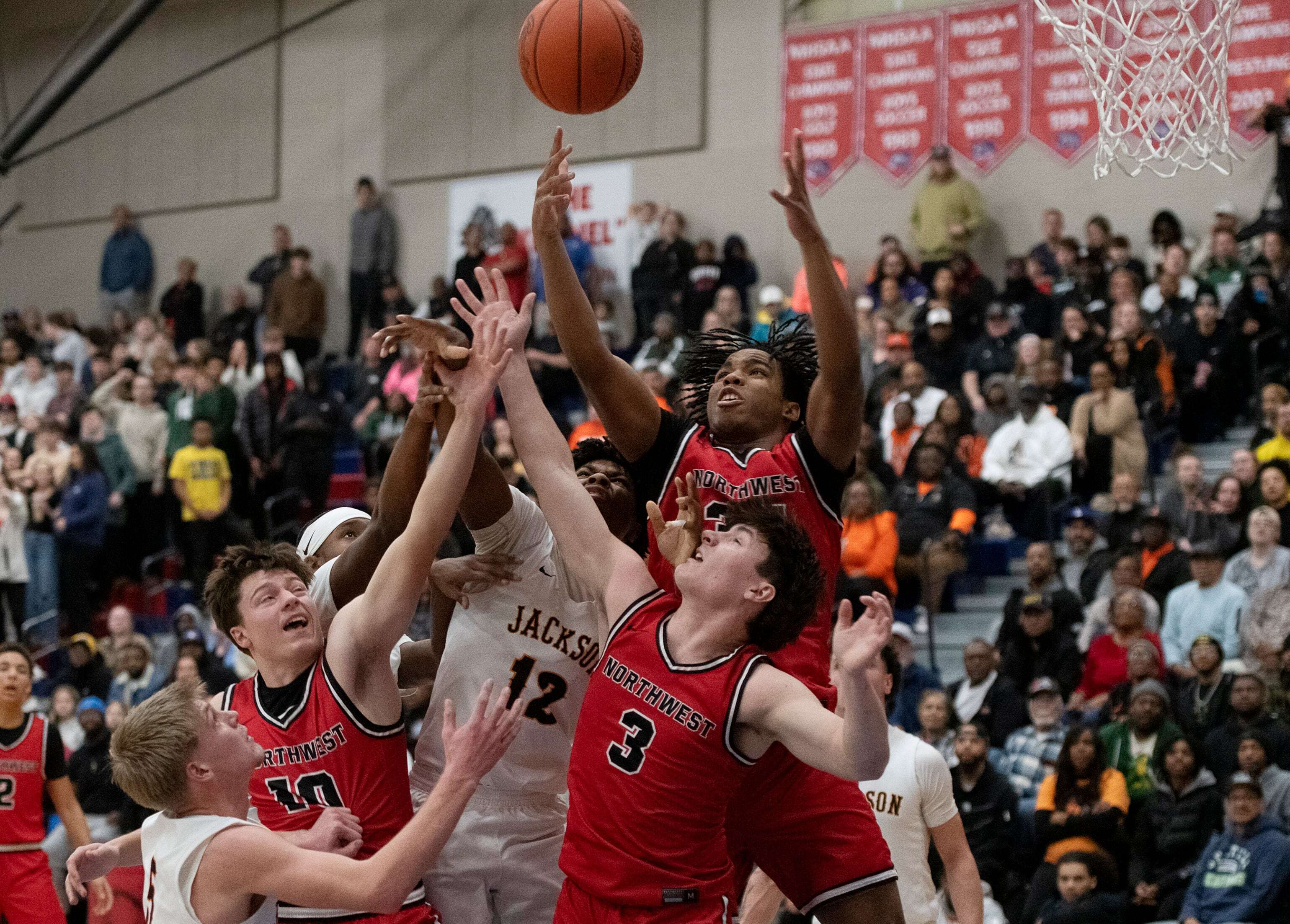 See photos as Jackson boys basketball wins first district title since 2012