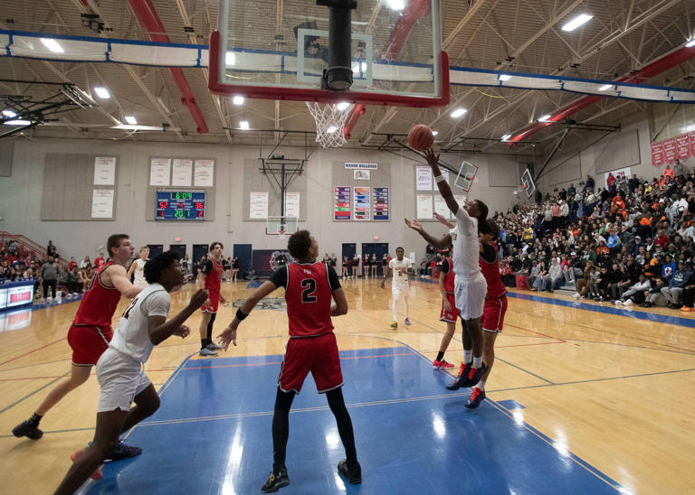 See photos as Jackson boys basketball wins first district title since 2012