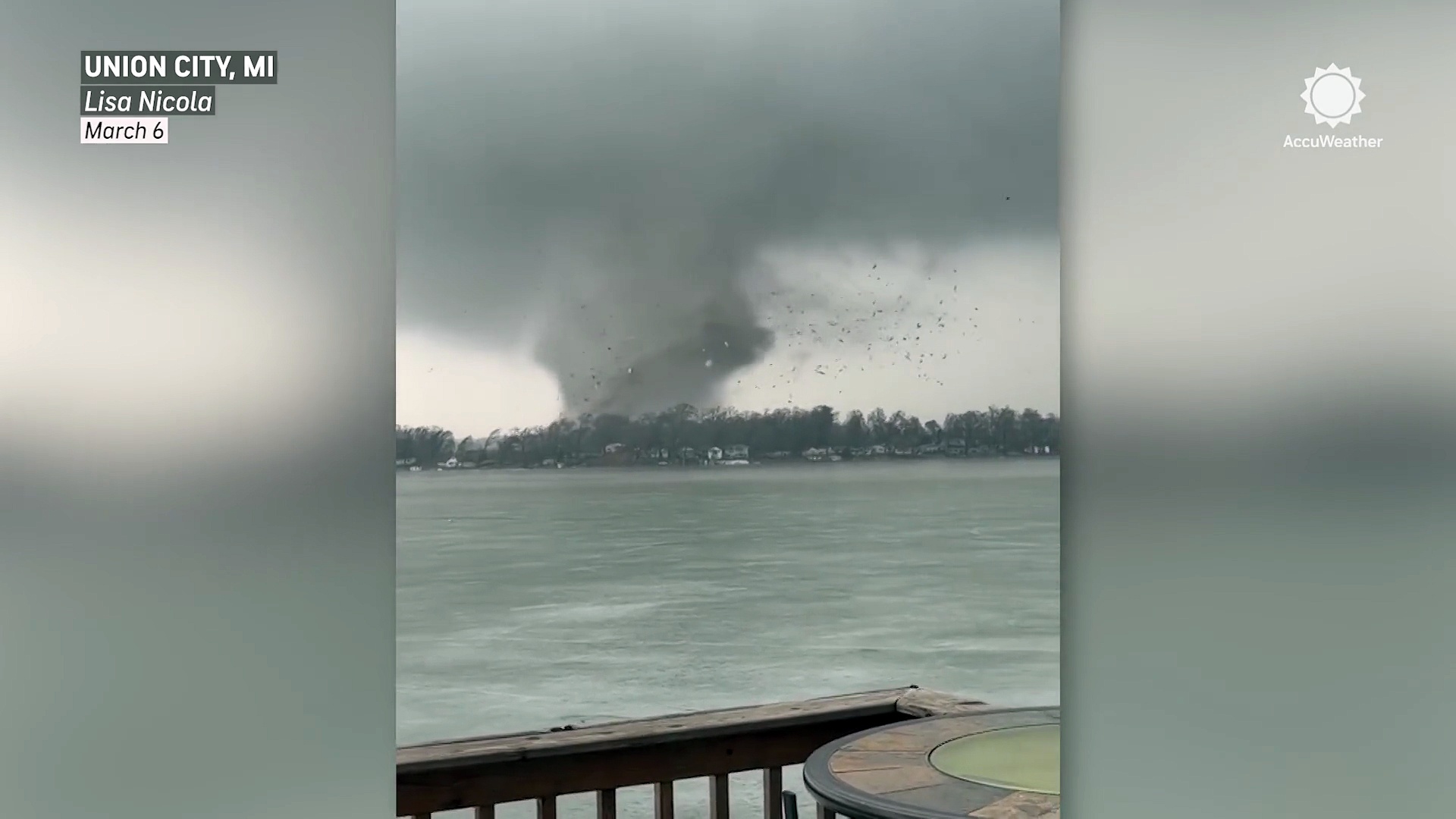 Powerful tornado sends debris flying in Michigan