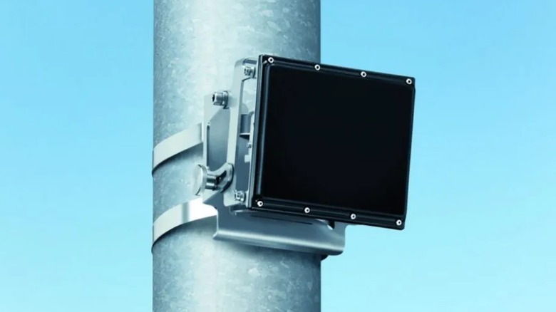 Those black boxes near traffic lights aren't cameras – here's what they ...
