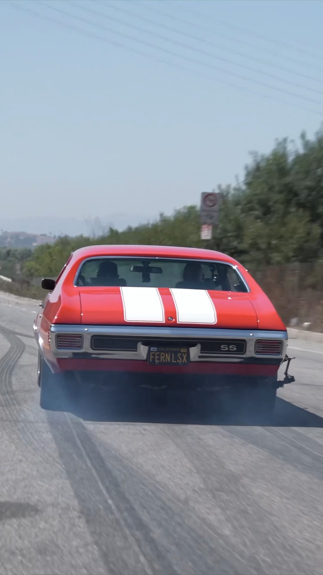 Big block Chevy Chevelle lights up the tires in a burnout