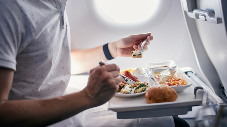 6 essential etiquette rules for eating on a plane