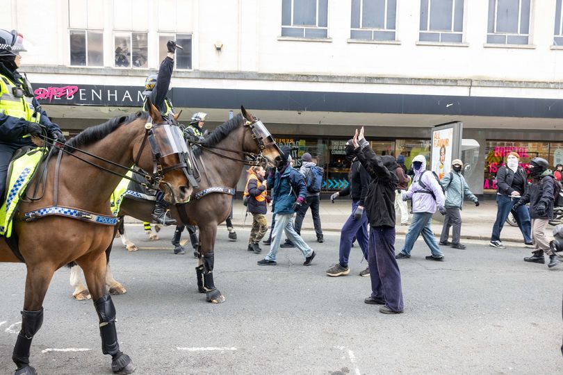 Arrests made as horseback officers use batons in Bristol protests