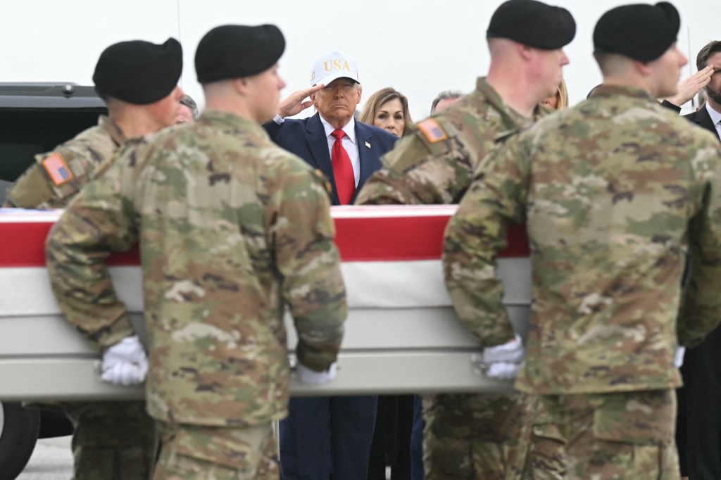 Somber day as Trump attends ceremony for six soldiers killed in Iran ...