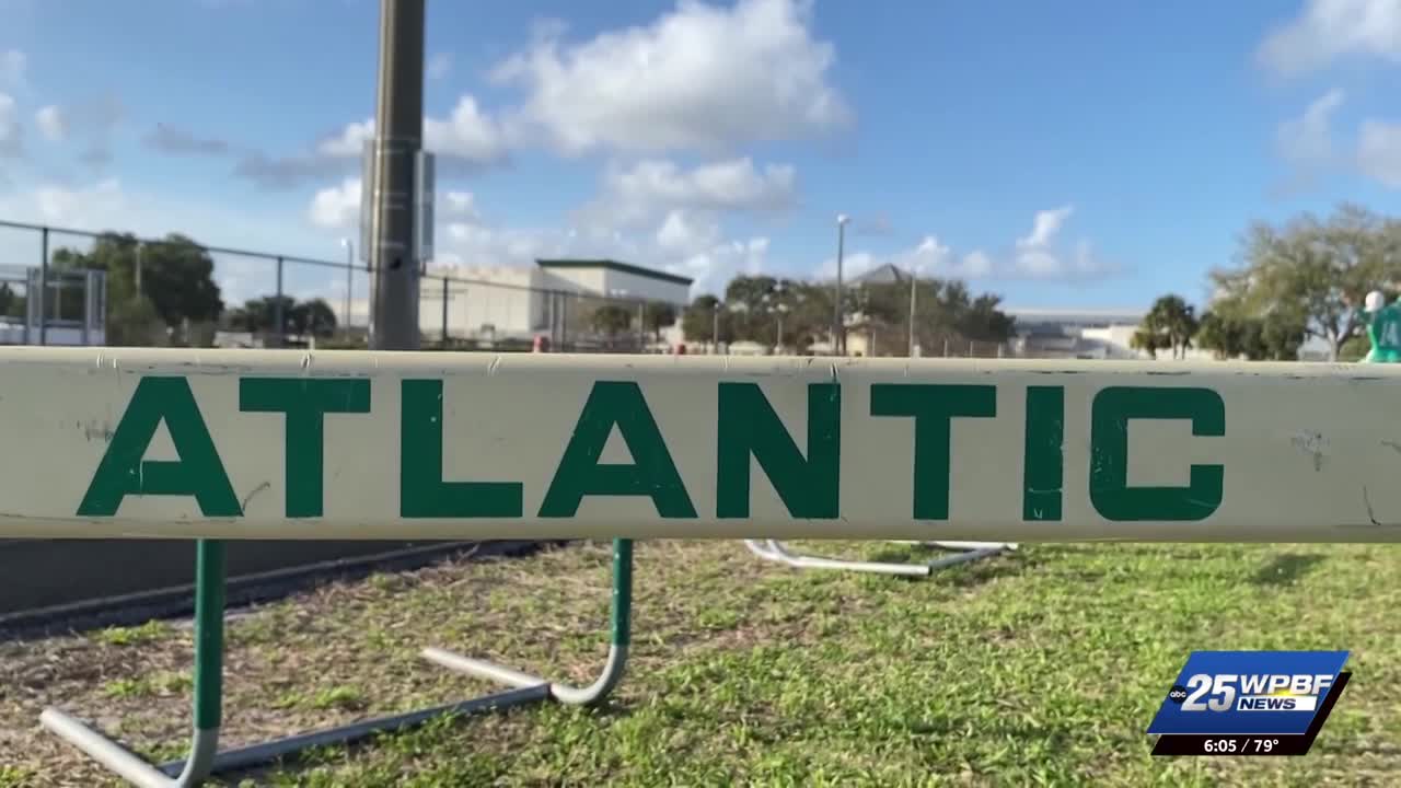 Man arrested after vehicle drives onto Atlantic High's athletic fields