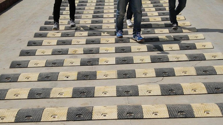 China installed pedestrian speed bumps on certain streets - and here's why