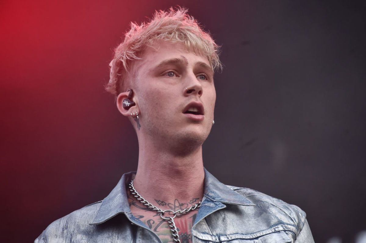 Machine Gun Kelly fan suffers brutal fall through gap in stage at ...