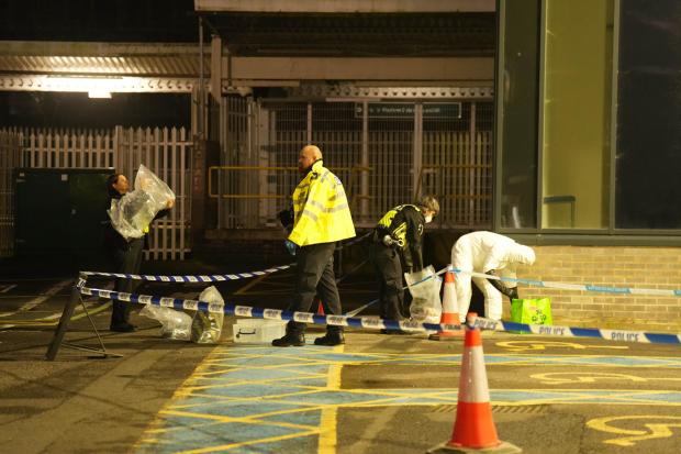 Manhunt launched after suspected acid attack at railway station