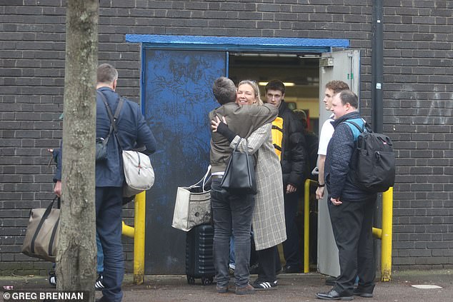 Noel Gallagher and Tori Cook sneak out of Euston Station side exit ...